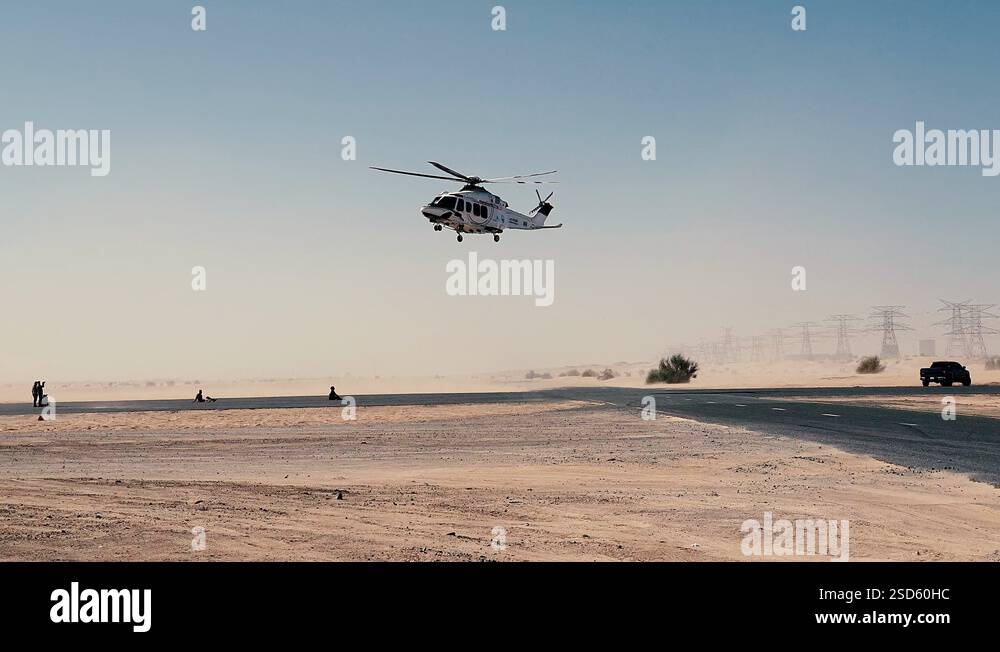 Police helicopter in the desert. Police training and rescue operation ...