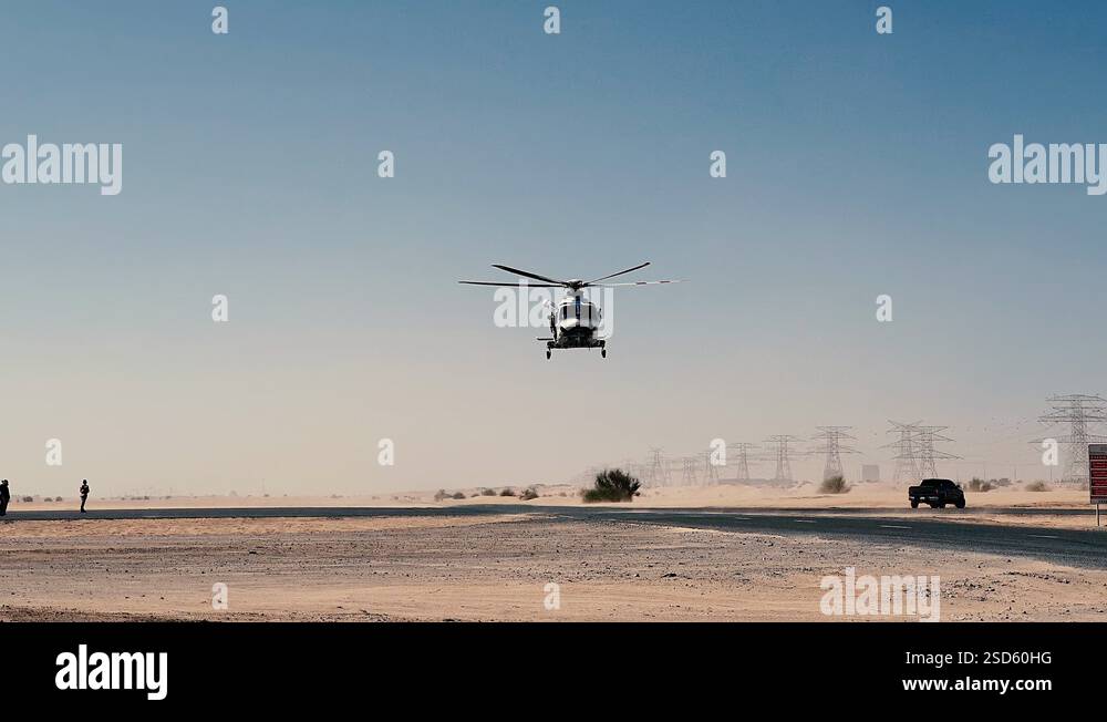 Police helicopter in the desert. Police training and rescue operation ...