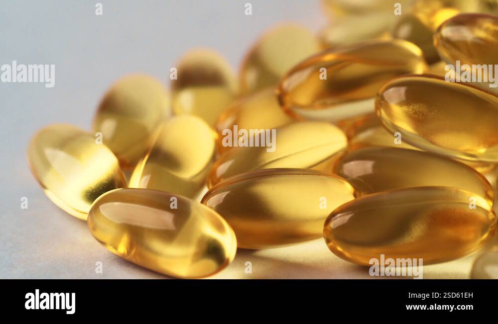 Omega 3 vitamin yellow supplement gel capsules or Fish Oil, Cod liver ...