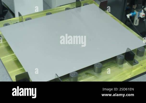 Automated robotic arm system with suction cups and pneumatic tubing ...