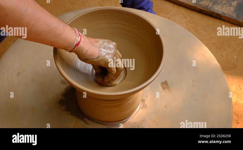 Skilled wet hands potter shaping Stock Videos & Footage - HD and 4K ...