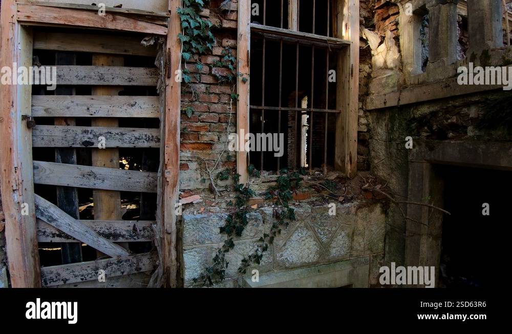 Old abandoned decay entrance building with broken door and window Stock ...