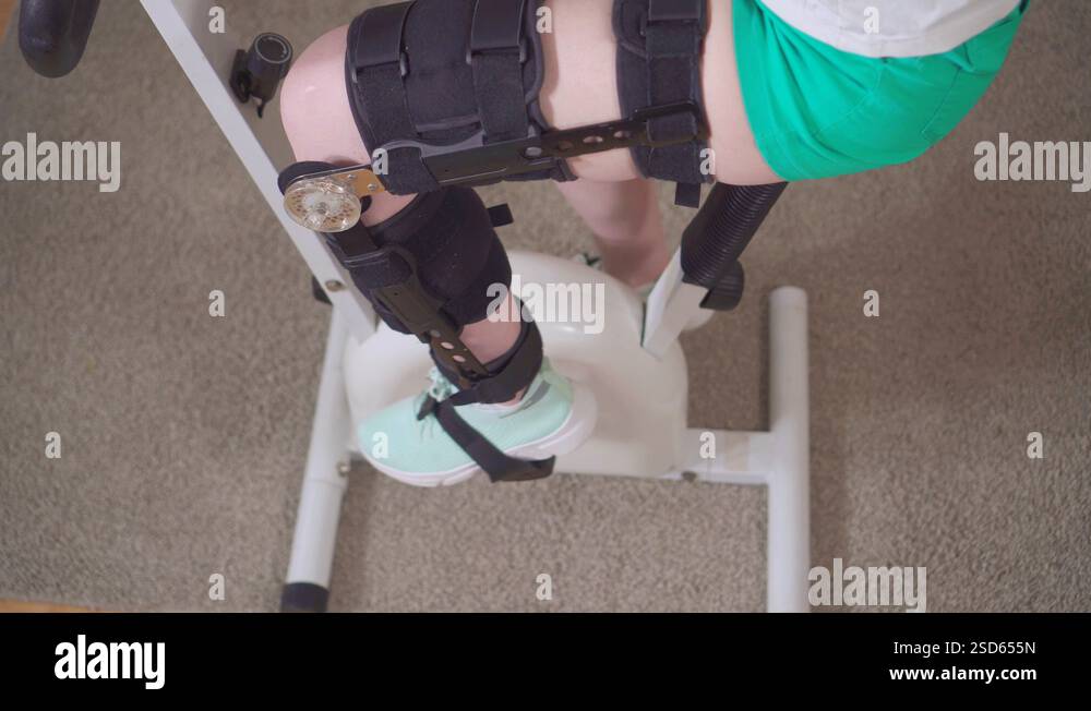 leg on a stationary bike knee bend orthosis knee brace after injury ...