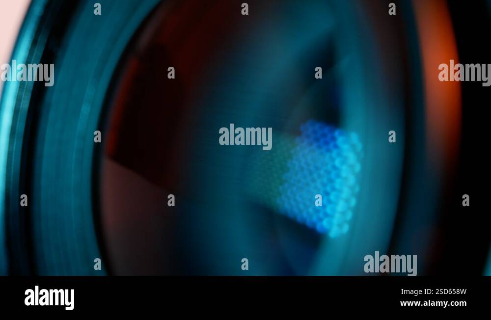 Camera lens optical system. Macro video. Game of lights and shadows ...