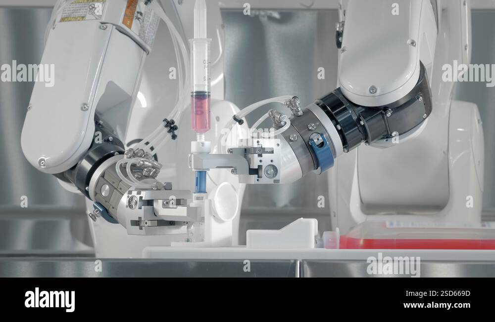 Robotic arm makes an injection with chemotherapy medicine. Two manipulators Stock Video Footage ...