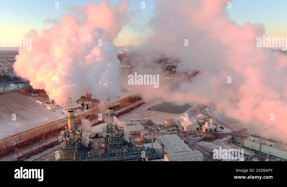 Factory emissions at sunrise, beautiful yet bad for the environment ...