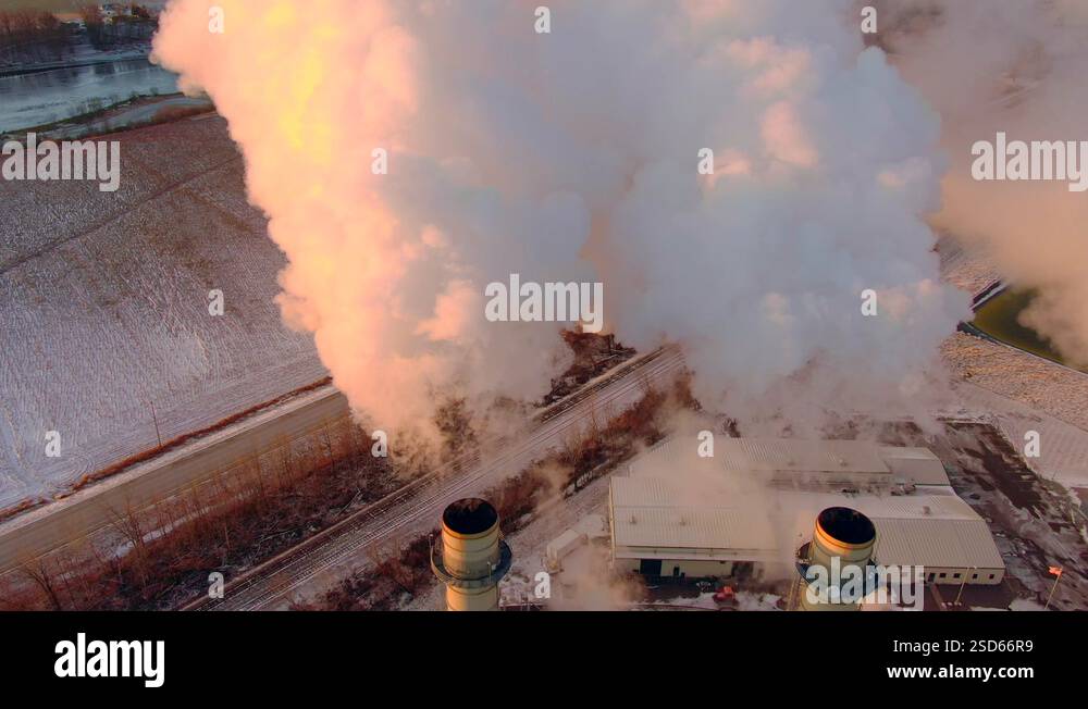Factory emissions at sunrise, beautiful yet bad for the environment ...