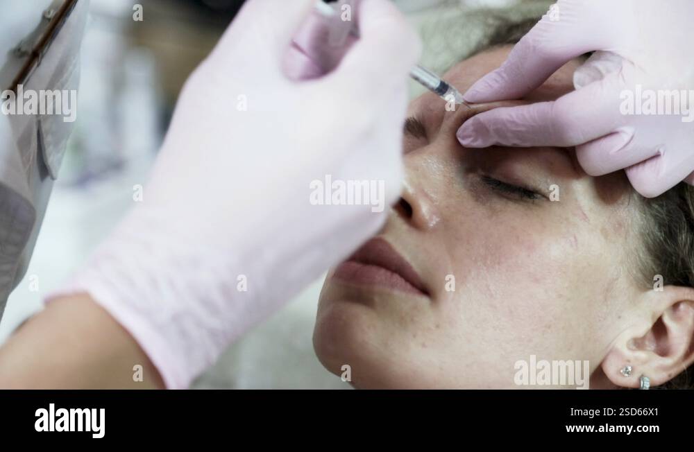 Close up of Facial injection and anti aging procedure for improving ...