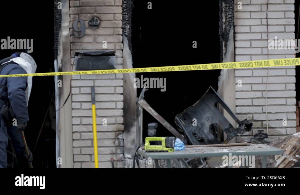 Arson fire investigation and clean up by fire marshal. On scene of an ...