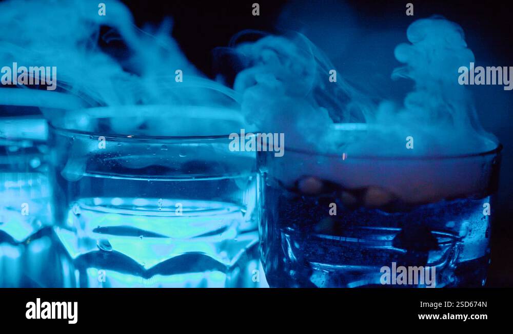 Loop boomerang forward and backward slow motion glasses and steam from ...