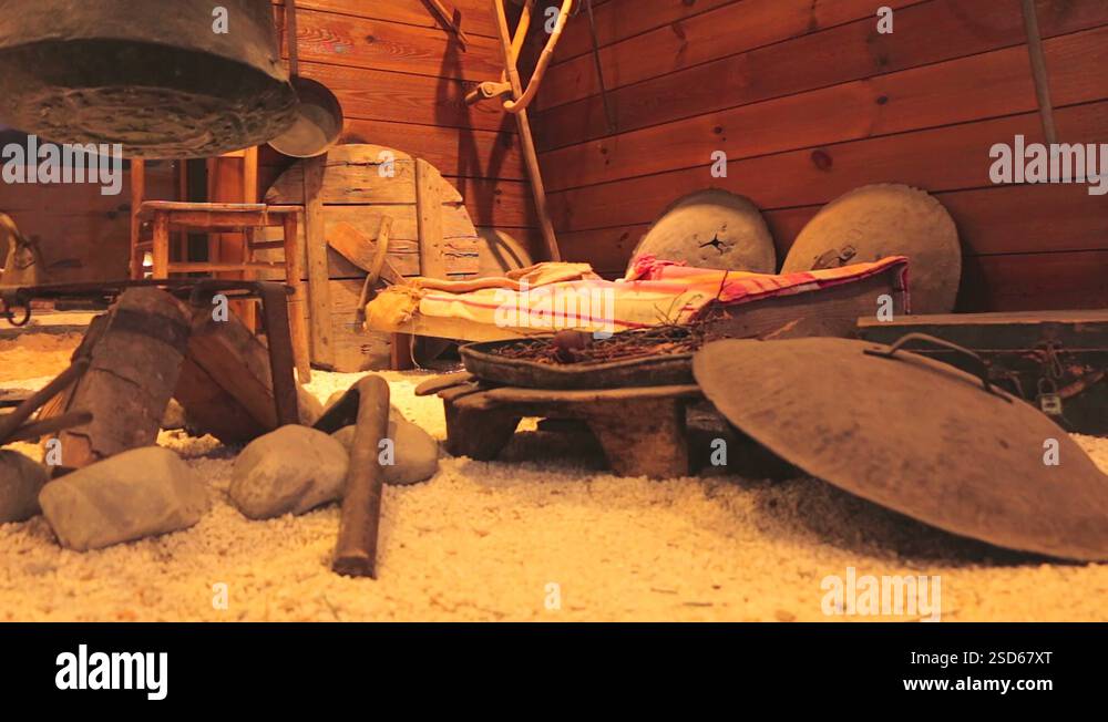 Traditional home items and furniture. Old dishes and wooden items in ...