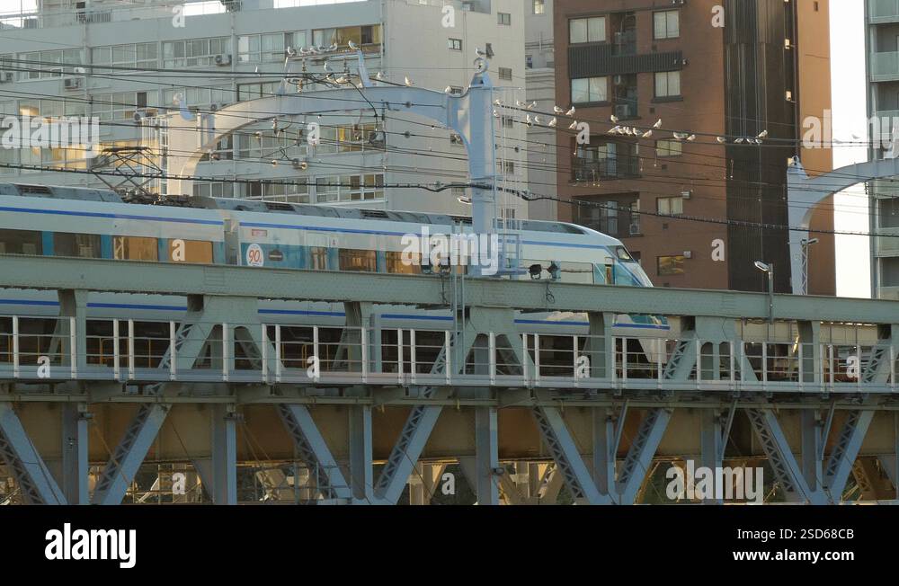 The slow moving train on the railtracks in Tokyo Japan Stock Video ...