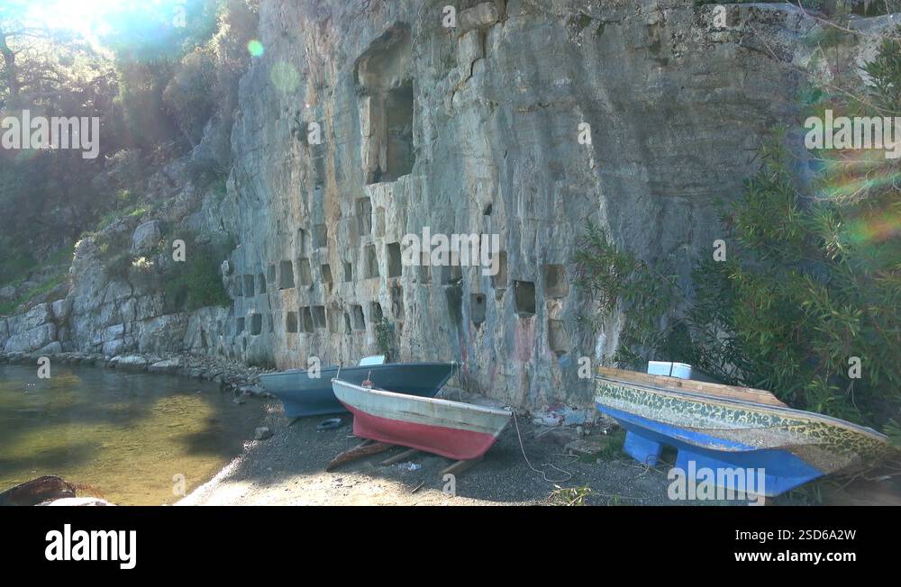 Ancient ash burial hollows in mountain wall Stock Video Footage - Alamy
