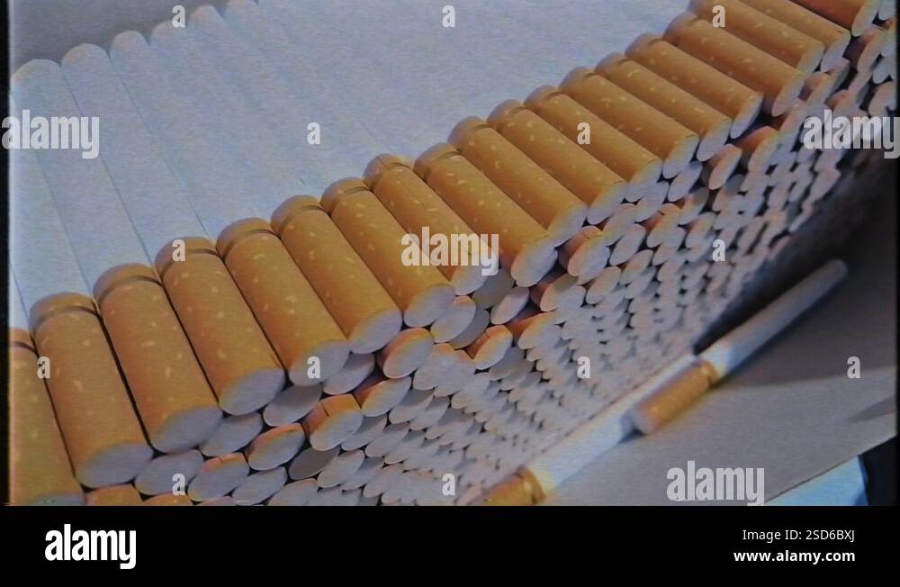 A lot of empty cigarette blanks in a large cardboard box. VHS video ...