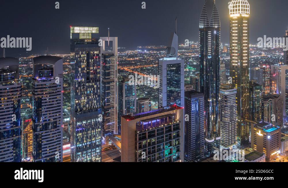 Skyline of the buildings of Sheikh Zayed Road and DIFC aerial night ...