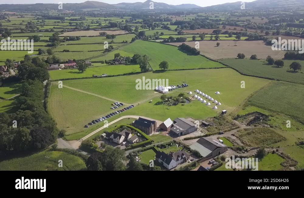 Aerial view. Wedding reception ceremony setup with big white tents and ...