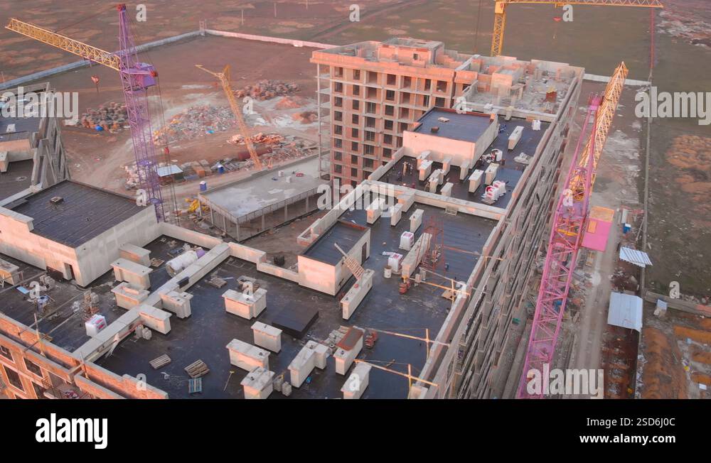 Construction site in the middle of the city and private houses at ...