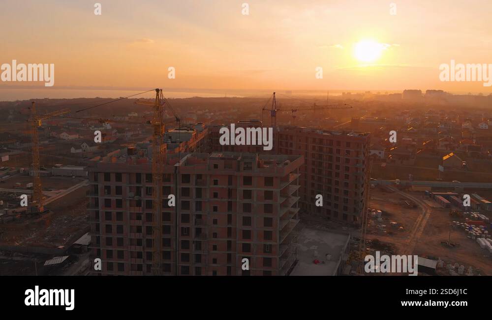 Construction site in the middle of the city and private houses at ...