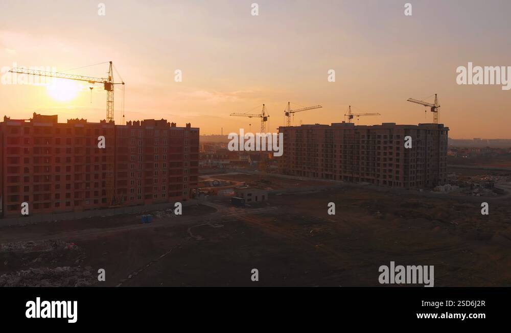 Construction site in the middle of the city and private houses at ...