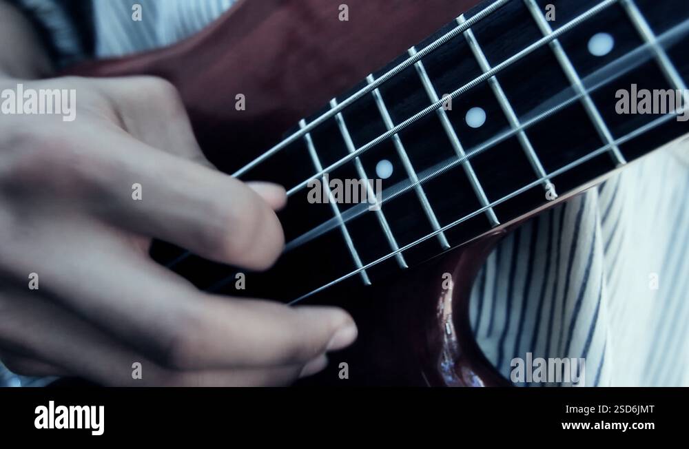 Young man play bass guitar guitarist jazz Rock and roll musician ...