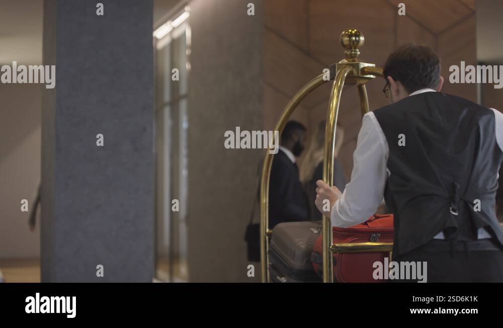Hotel bellhop Stock Videos & Footage - HD and 4K Video Clips - Alamy