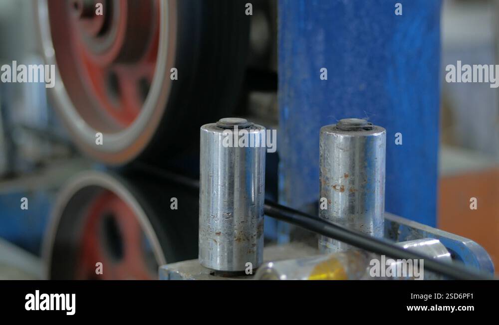 Production of copper cable. Rotating shafts with copper wire. Cable ...