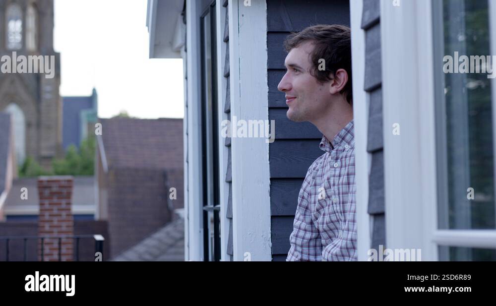 man listening to friends tell story while having beer drinks outdoors ...