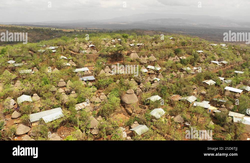 Aerial footage of beautiful traditional homes in Konso, rural community ...