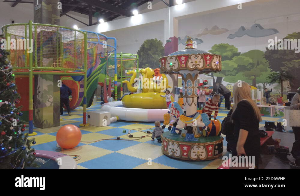 Small children play on the Playground in a large supermarket Stock ...