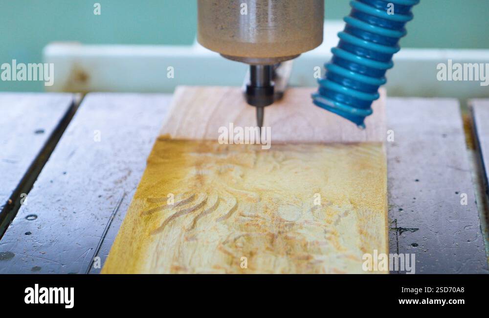 Milling machine tool carves out a pattern in a plank Stock Video ...