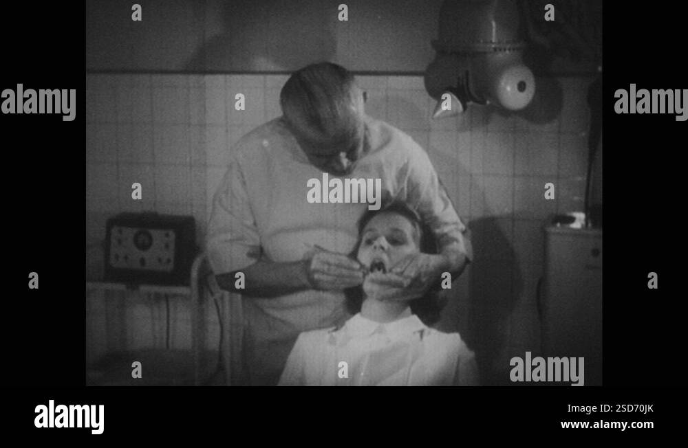 1940s: Dentist uses tool to scrape teeth in girl's mouth as she's ...