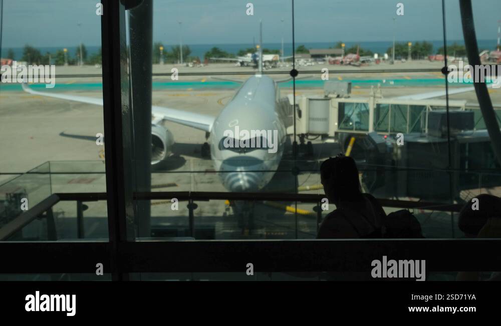 passengers boarding plane to flight on aircraft in departure gate ...