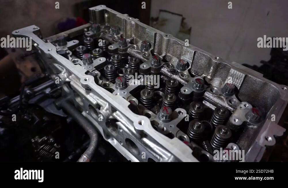 repair of an engine, a gas distribution valve in a motor of a car Stock ...