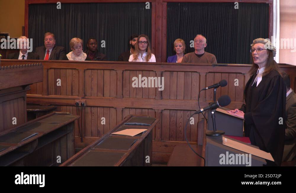 4K: Female Barrister / Lawyer addressing the Jury people in Court ...