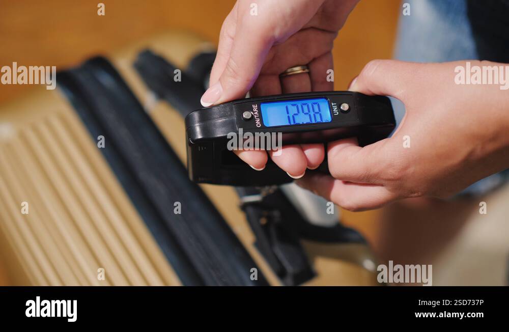 The display of road scales shows the weight of the baggage Stock Video ...