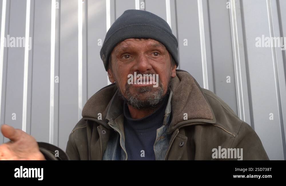 Face of homeless man living on the streets for many years. Wretched ...