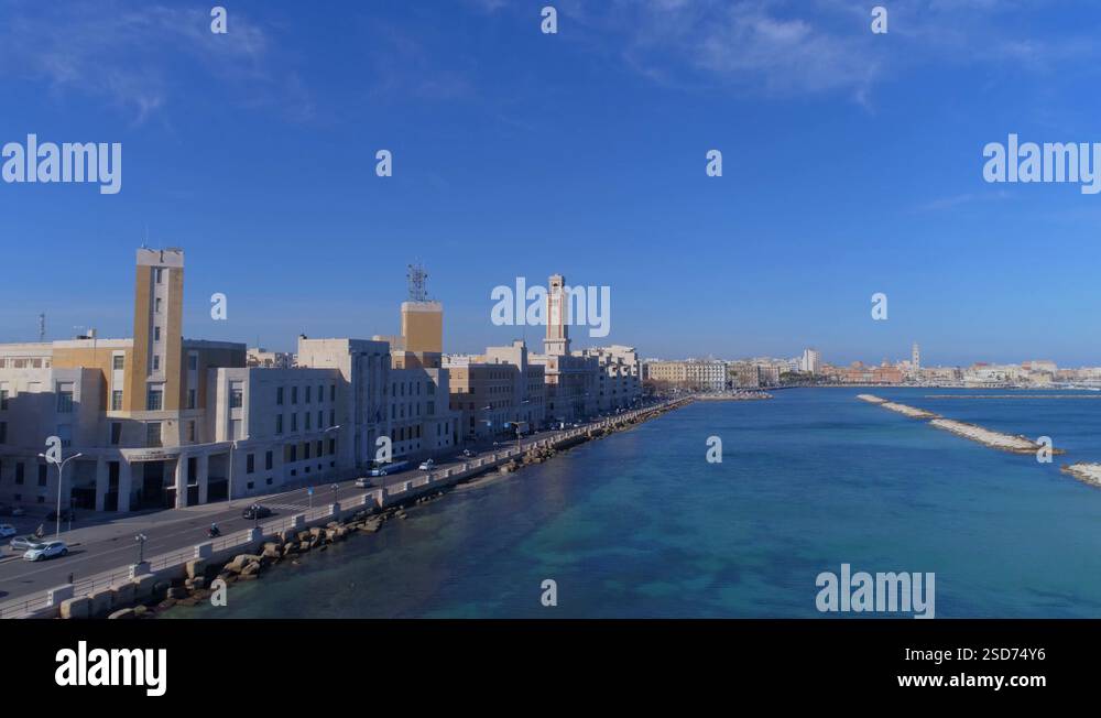Cinematic view of sea and old town with blue sky in Bari, Puglia, Italy ...