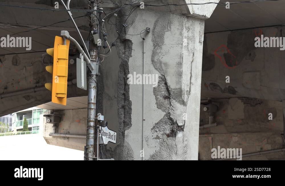 Crumbling and decaying city highway and bridge concrete infrastructure ...