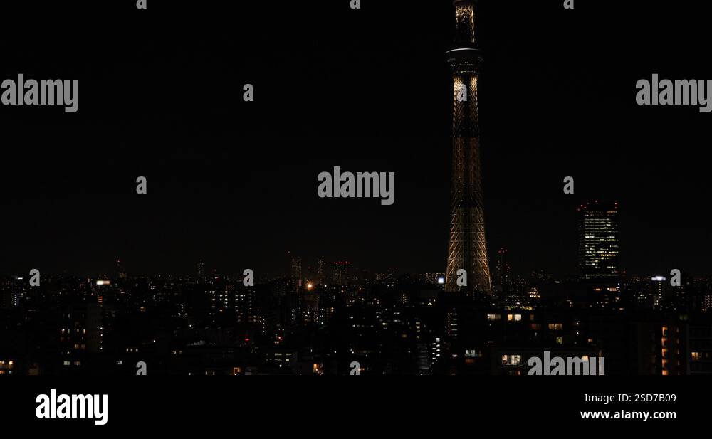 A night Tokyo sky tree at the urban city in Tokyo long shot Stock Video ...