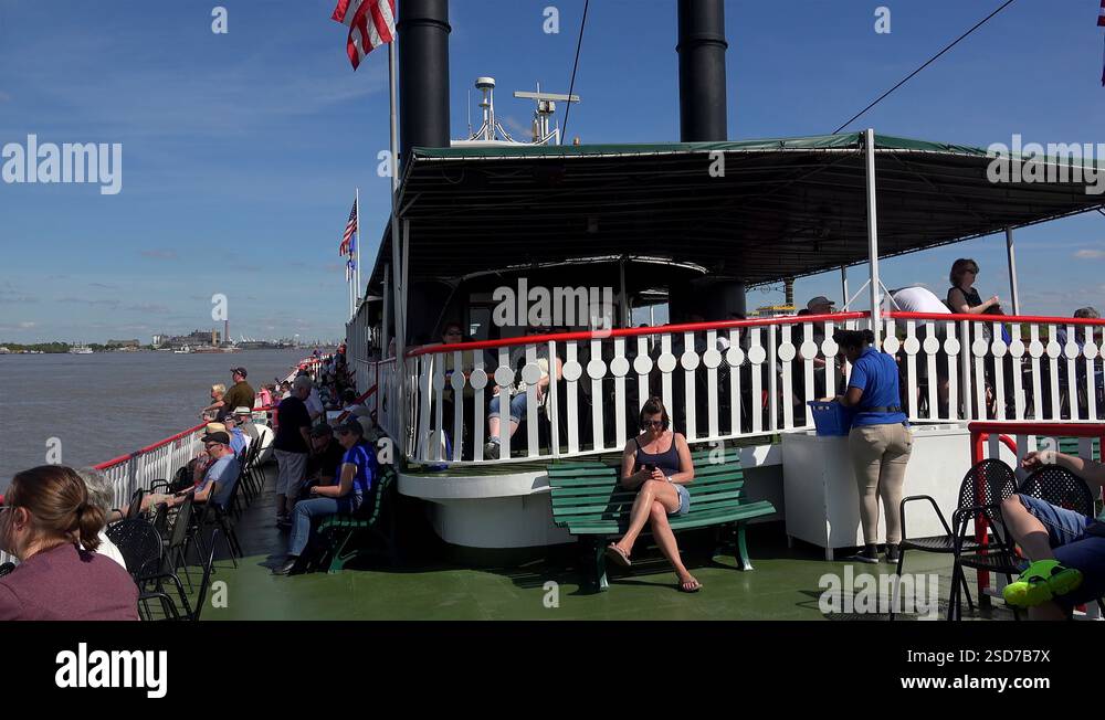 Tourists on the deck of the Natchez steamboat. New Orleans, Louisiana ...