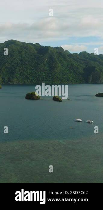Drone view of boats in Siete Pecados and Coron Island. Palawan ...