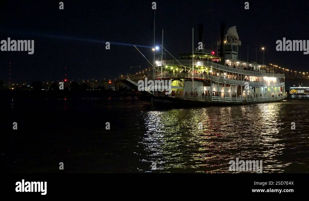 Natchez steamboat at the Mississippi river by night (with steam whistle ...