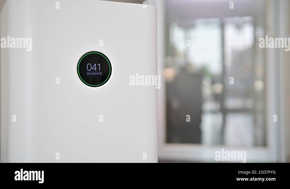 4K Air purifier with monitor screen that show good air quality Stock ...
