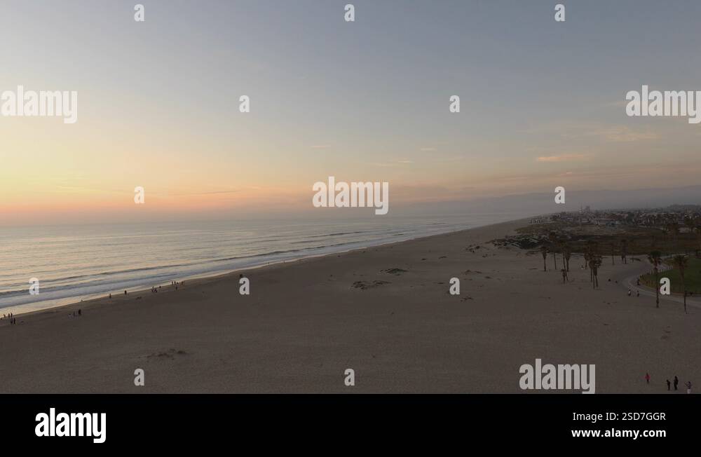 Sunset as waves crash onto beautiful West Coast beach in California 60p ...