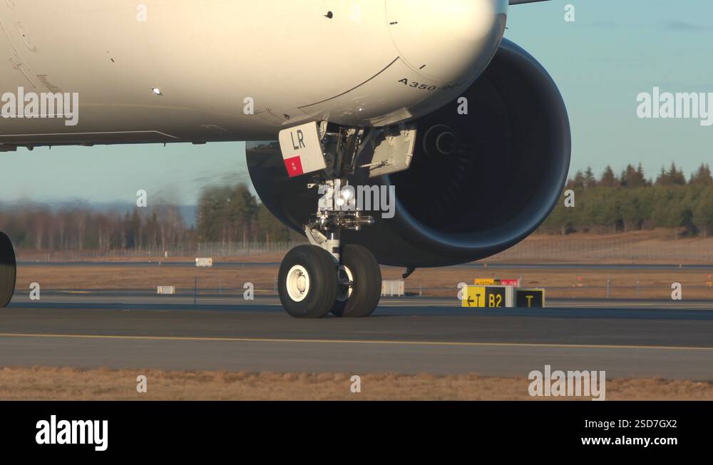 airplane airbus a350 qatar airways nose wheel details sunny evening ...