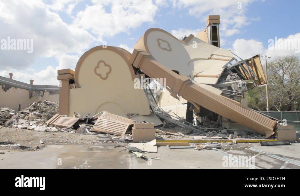Front of building collapses and falls at construction demolition Stock ...