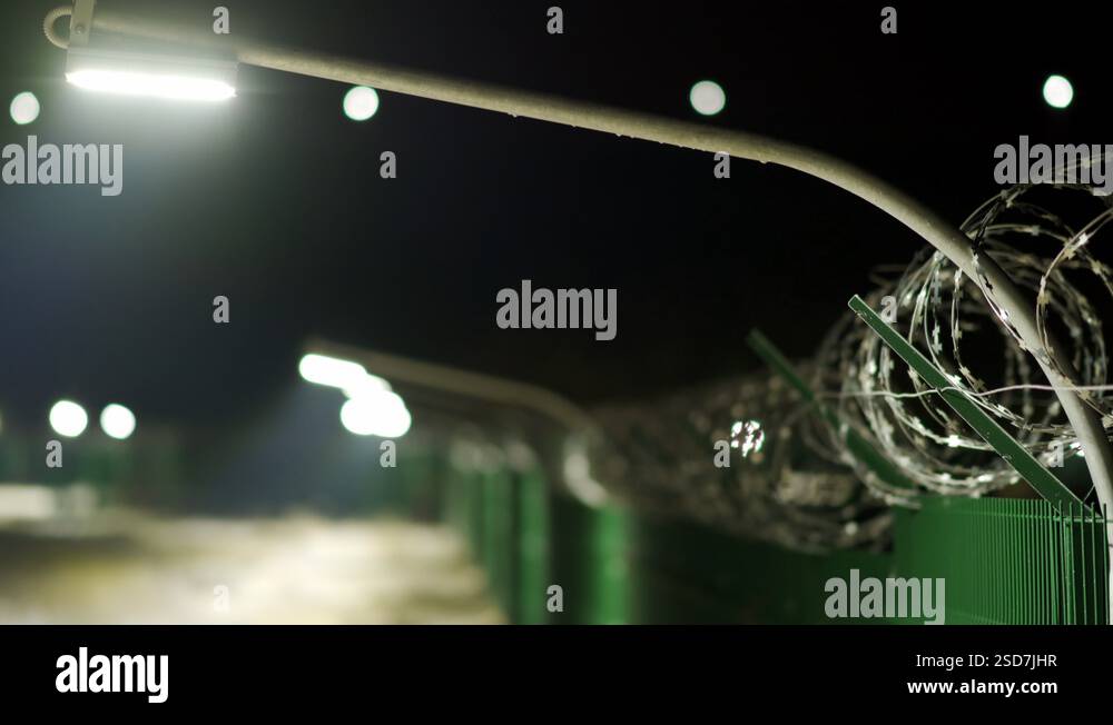 Perimeter security fencing system, razor wire fence with lighting at ...