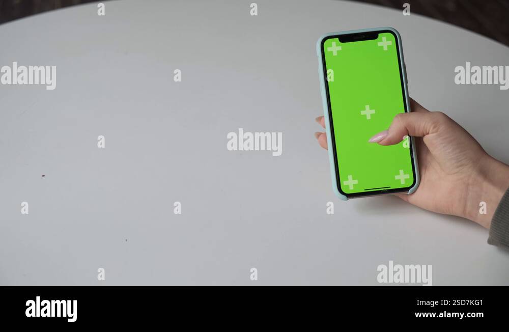 Mobile phone with green screen close up. Chroma key on the cell phone ...