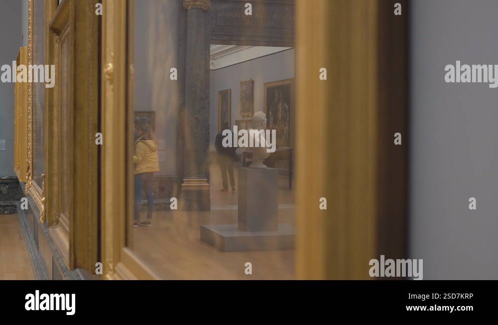 Reflection of people in a Painting Glass inside Art Gallery Painting ...