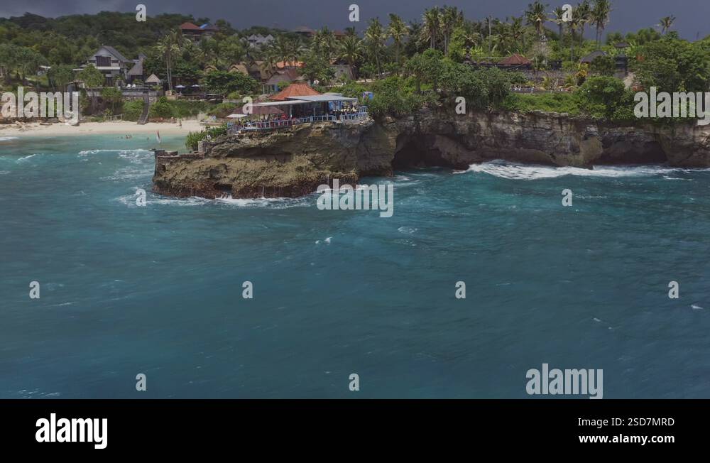 Bali Indonesia Aerial v35 Flying around and over Mahana Point looking ...